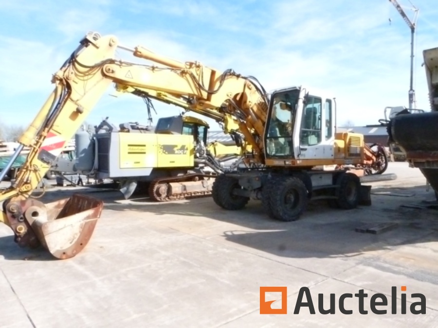 Wheeled excavator Liebherr A 900 Litronic used at auction - Auctelia
